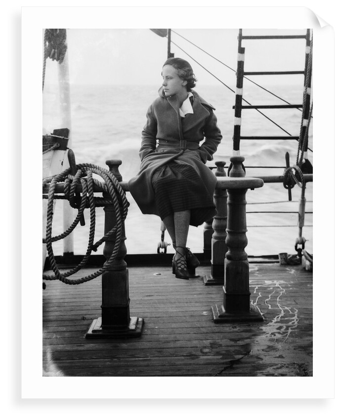 Elisabeth Jacobsenin shore clothes seated on the poop rail, aboard 4 ...